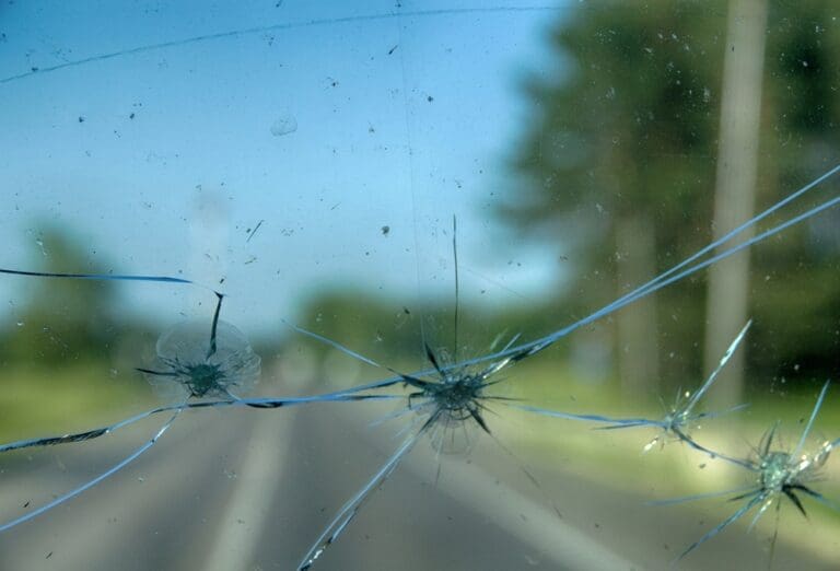 Flying Debris Hit My Car: Who Is Liable? What To Do Next?